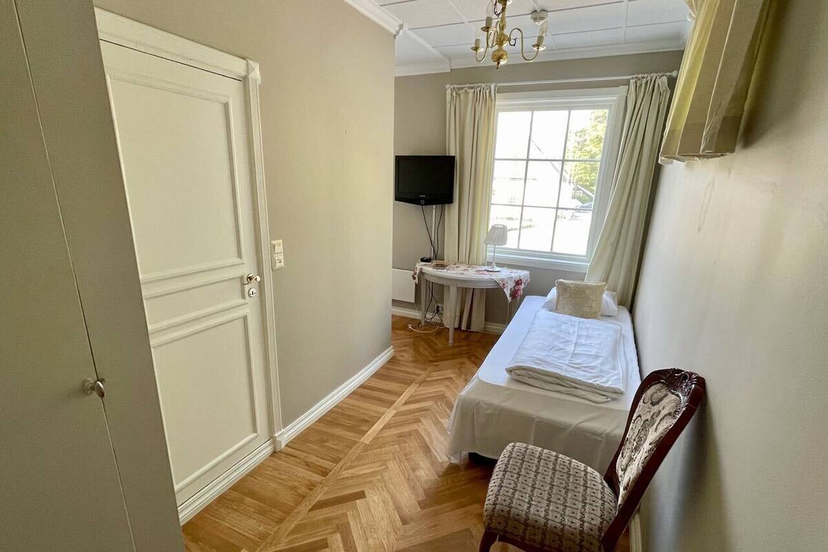 Quarto Twin | Berços/camas para crianças, Wi-fi grátis, roupa de cama fornecida