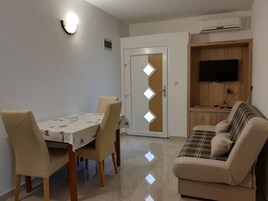 Apartamento (A3) | Sala de estar | TV