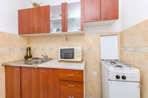 Estúdio (A2) | Cozinha privada | Geladeira, cooktop