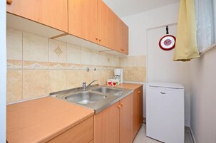 Estúdio (A2) | Cozinha privada | Minifrigorífico, uma placa de cozinha, uma máquina de café expresso