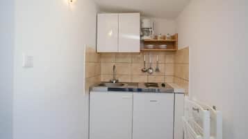 Estúdio (A1) | Cozinha privada | Frigobar, cooktop, máquina de café expresso