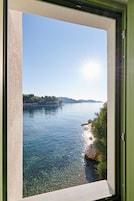 Quarto Triplo, vista para o mar | Vista para a água