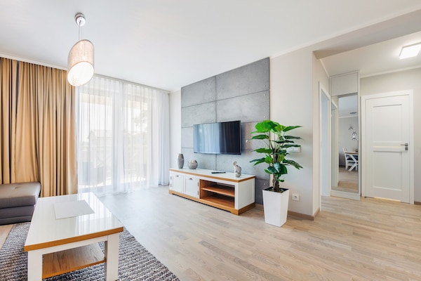 Apartamento (36, Orła Białego 1) | Área de estar | TV de tela plana