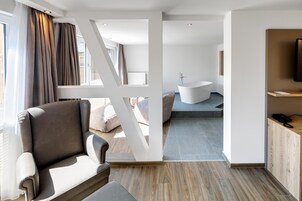 Suíte panorâmica (Eichhornkobel) | Área de estar | TV