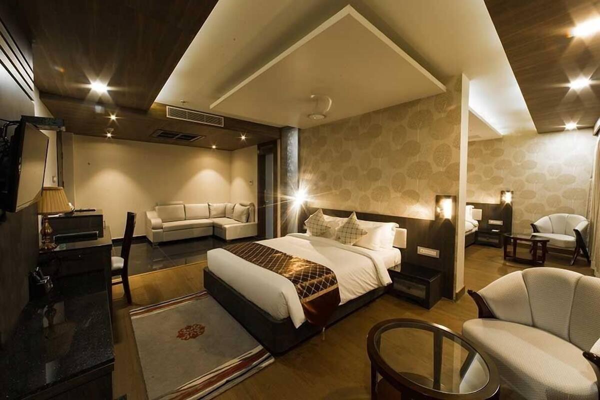 Quarto Familiar | 1 quarto, minibar, cofre no quarto, ferro/tábua de engomar