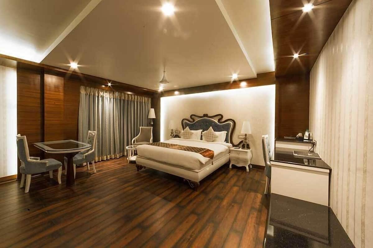 Quarto de Luxo | 1 quarto, minibar, cofre no quarto, ferro/tábua de engomar