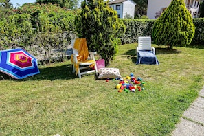 Terraço com espreguiçadeiras