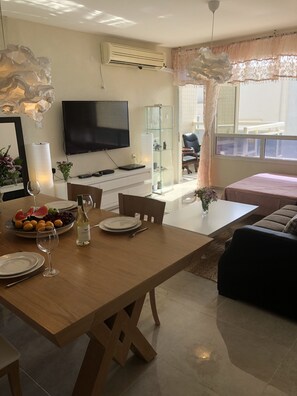 Apartamento Panorâmico | Sala de estar | Smart TV 