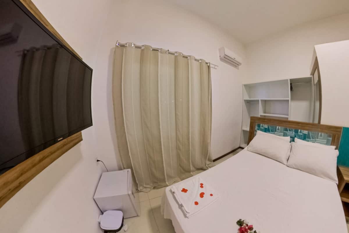 Quarto duplo standard com banheiro compartilhado | 1 quarto, cortinas blackout, Wi-Fi de cortesia, roupa de cama