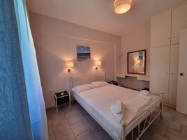 Apartamento conforto, 1 quarto | Cofres nos quartos, Wi-Fi de cortesia, roupa de cama
