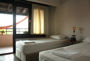 Suíte standard | Wi-Fi de cortesia, roupa de cama