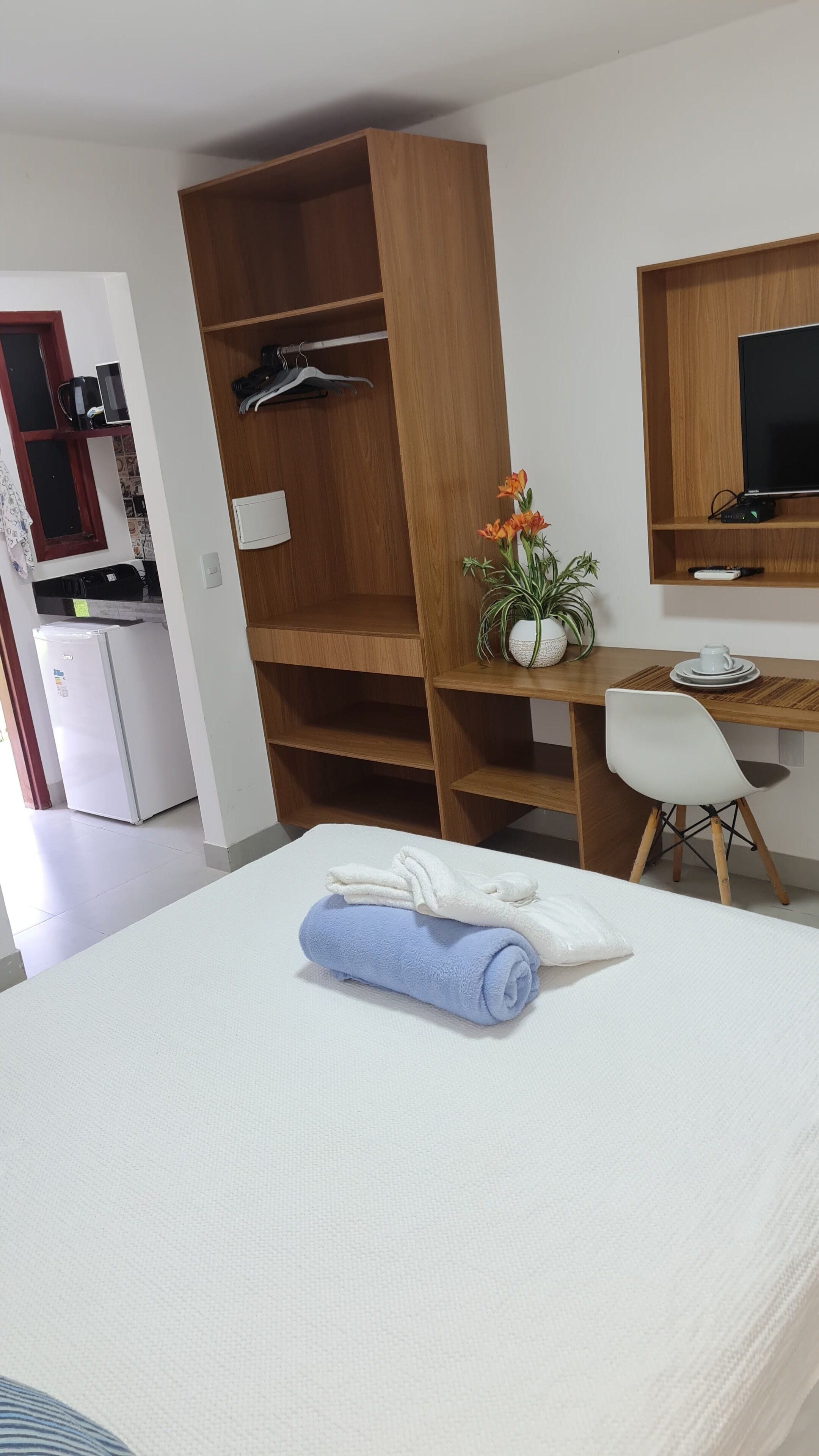Suíte tradicional | Frigobar, individualmente mobiliados, ferros/tábuas de passar roupa