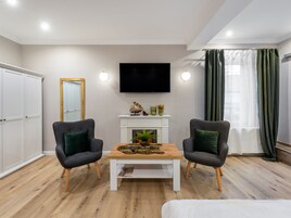 Suíte estúdio luxo | Área de estar