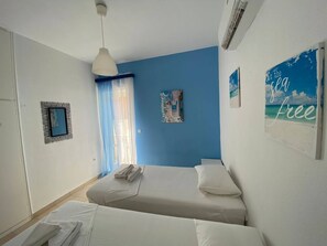 Apartamento, 2 quartos, vista para o mar | 2 quartos, cofres nos quartos, berços (sobretaxa), Wi-Fi de cortesia