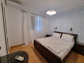 Apartamento superluxo, 2 quartos | Berços (sobretaxa), Wi-Fi de cortesia