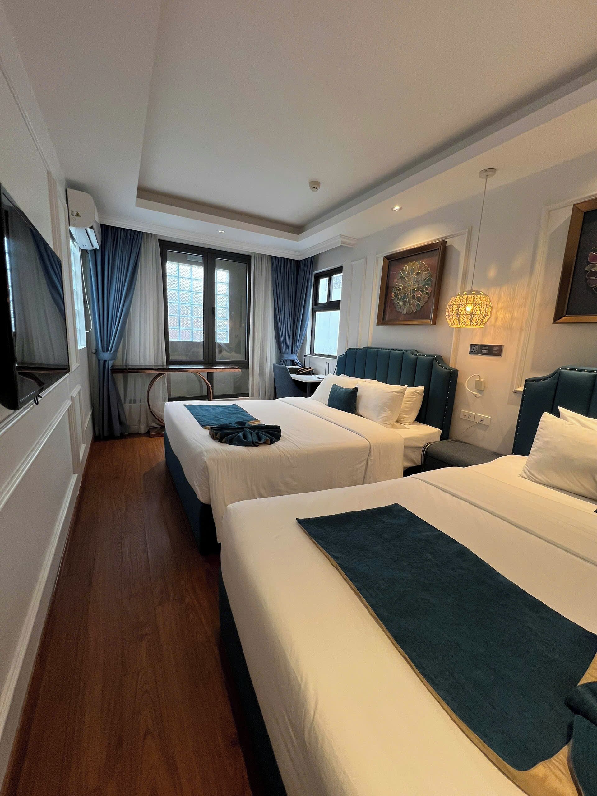 Quarto família | Frigobar, cofres nos quartos, escrivaninha