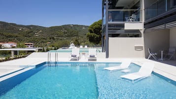 Quarto casal premium, piscina particular | Piscina particular