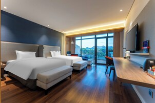 Quarto standard, 2 camas de solteiro, vista para o rio | Roupa de cama