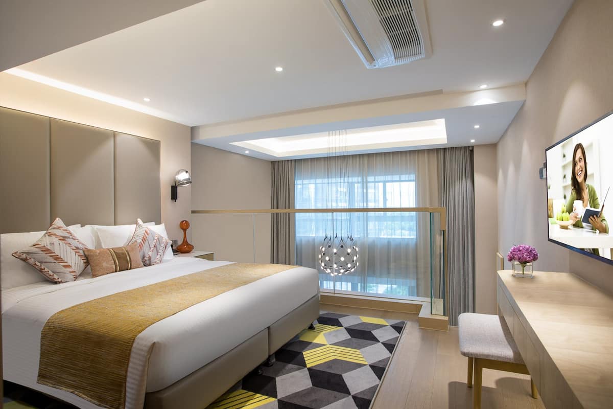 Loft Deluxe, 1 quarto | Cofre no quarto, secretária, cortinas/cortinados opacos 