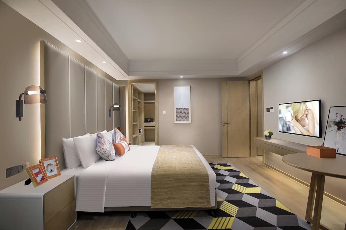 Apartamento Executivo, 1 quarto | Cofre no quarto, secretária, cortinas/cortinados opacos 