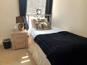 Quarto solteiro, suíte