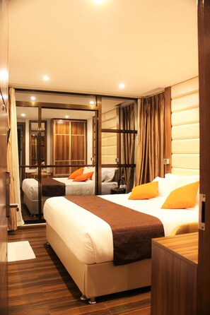 Minibar, secretária, quartos insonorizados, Wi-fi grátis 