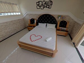 Suíte (Tropical) | Frigobar, Wi-Fi de cortesia, roupa de cama