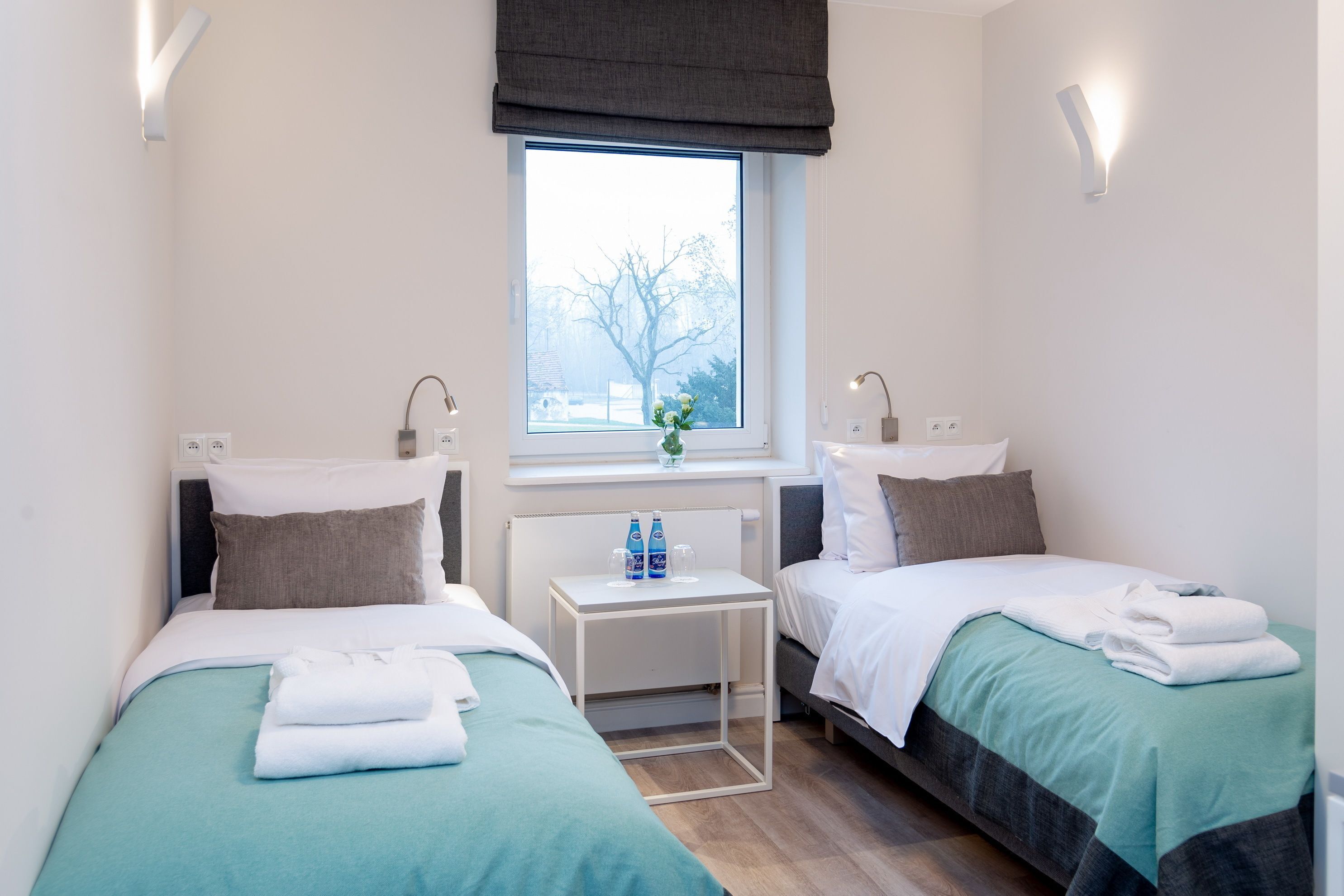 Quartos à prova de som, Wi-Fi de cortesia, roupa de cama