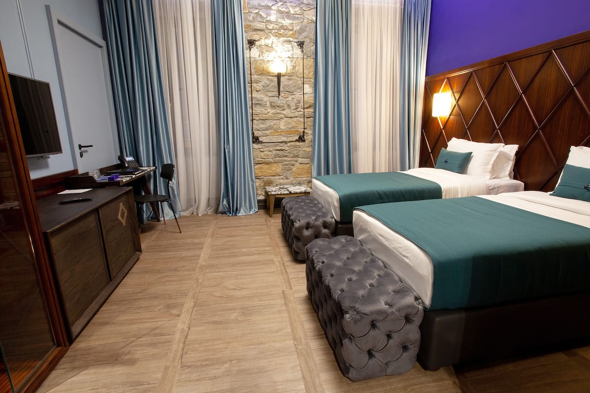 Quarto Twin Superior | Minibar, secretária, quartos insonorizados, Wi-fi grátis 