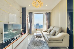 Apartamento, 2 quartos | Roupas de cama premium, frigobar, individualmente decorados