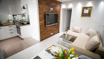Apartamento Comfort | Sala de estar | Televisor LED