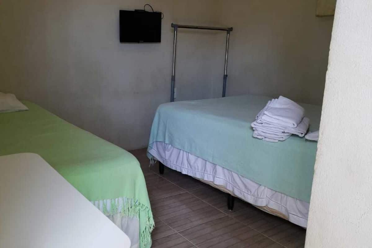 Quarto Triplo | 1 quarto, minibar, Wi-fi grátis, roupa de cama fornecida