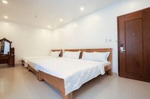 Quarto família | Frigobar, escrivaninha, quartos à prova de som, Wi-Fi de cortesia