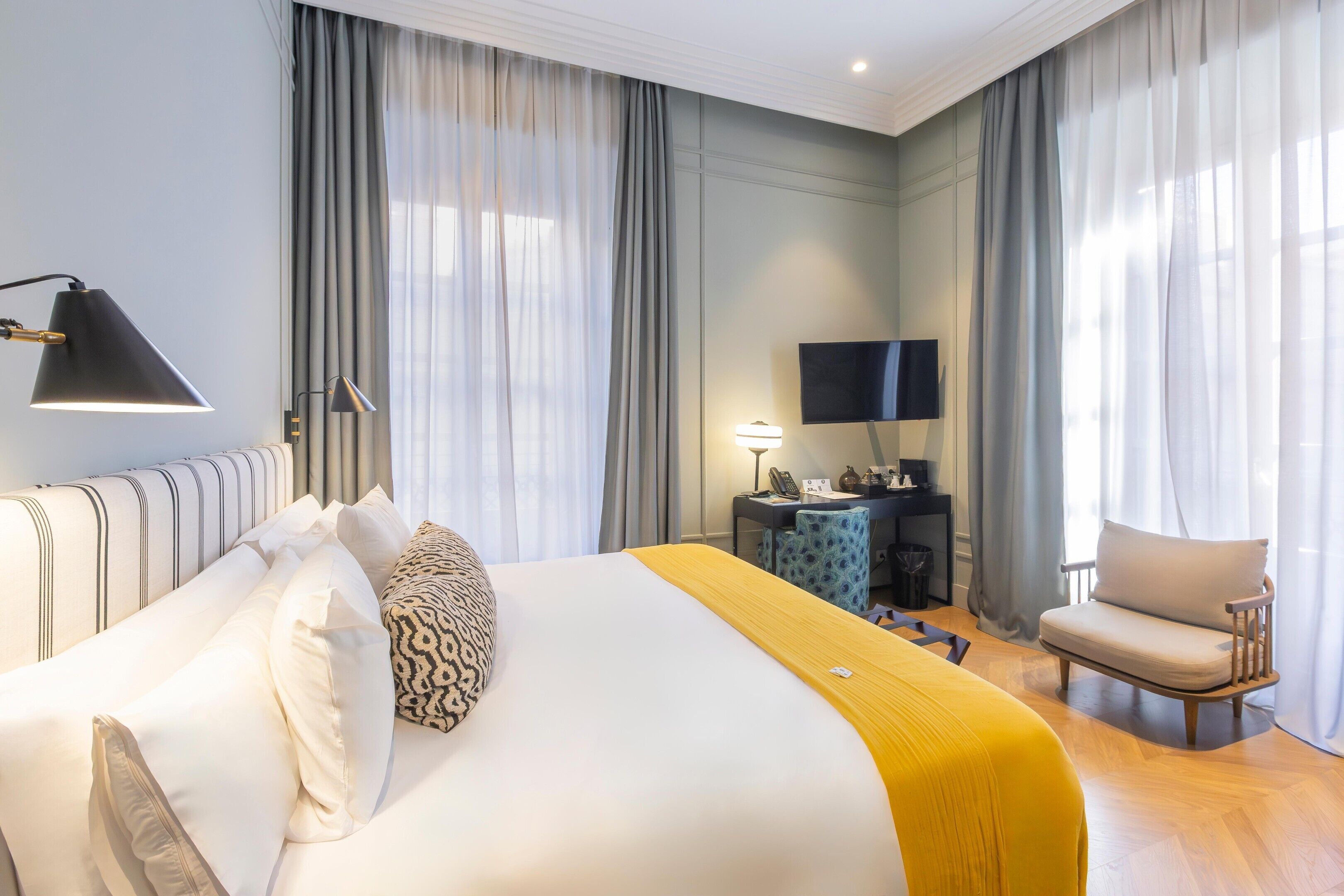 Quarto Duplo ou Twin | Edredões de penas, minibar, cofre no quarto, secretária 