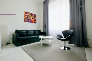 Apartamento, 1 quarto | Sala de estar