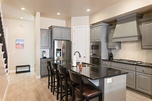 Casa geminada, 4 quartos | Cozinha privada | Geladeira, micro-ondas, fogão, cafeteira/chaleira