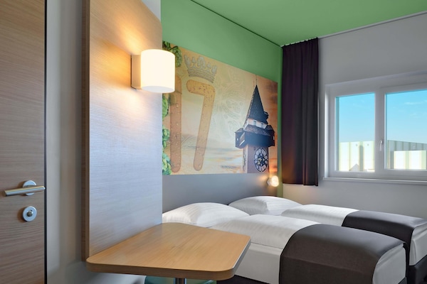 Secretária, quartos insonorizados, Wi-fi grátis