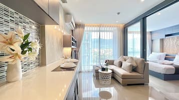 Junior Suite, Twin Beds | 1 quarto, edredons de pluma, camas Select Comfort, cofres nos quartos