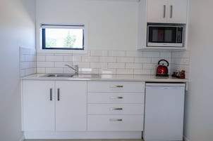 Quarto família, 2 quartos | Cozinha privada | Geladeira, micro-ondas, cafeteira/chaleira, chaleira elétrica