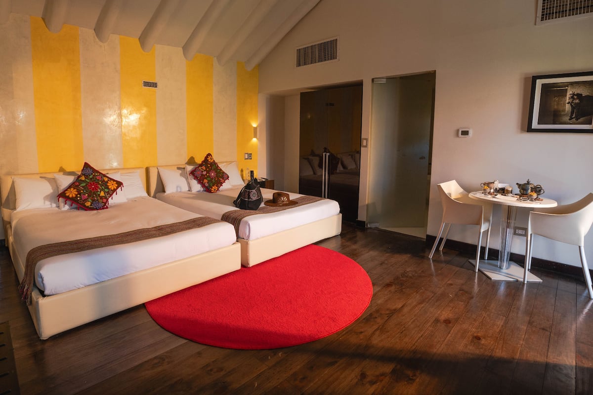 Suíte | Lençóis italianos Frette, camas Select Comfort, frigobar