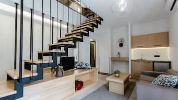 Apartamento luxo, 2 quartos, para não fumantes | Área de estar | Smart TV, Netflix