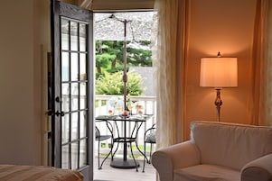 Quarto luxo, 1 cama King, lareira, no jardim | Vista do quarto