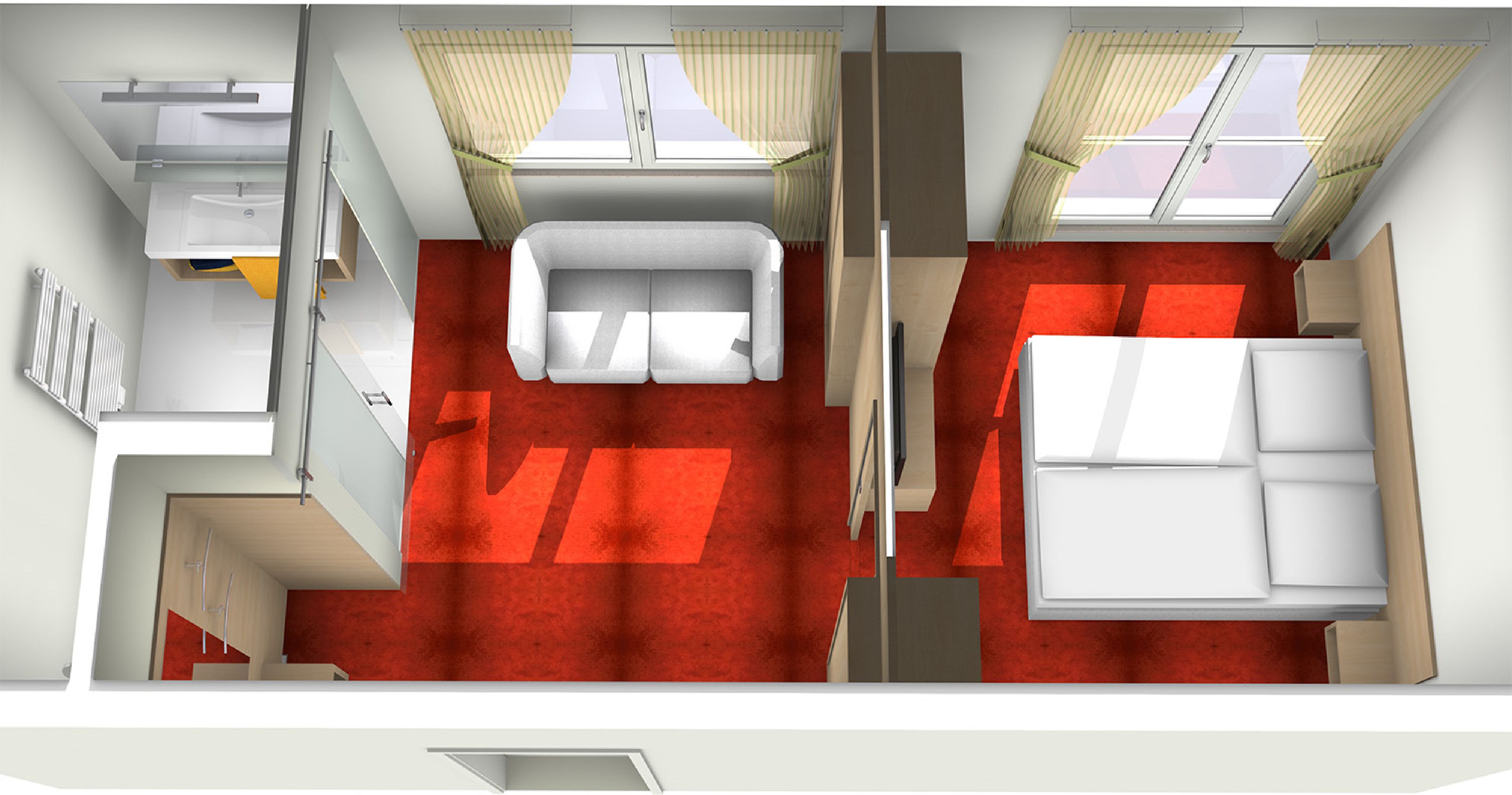 Quarto de hotel com carpete vermelho, cama, sofá, escrivaninha e janela.