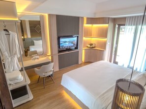 Bungalow, banheira, junto ao jardim | Roupa de alta qualidade, minibar, cofre no quarto, secretária 