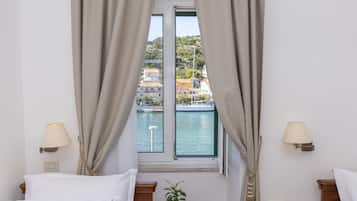 Suíte luxo, vista para o mar | 1 quarto, camas Select Comfort, frigobar, cofres nos quartos