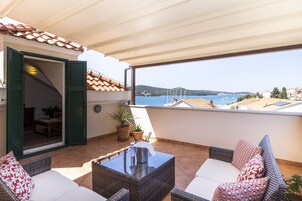 Suite Deluxe, vista para o mar | Terraço/pátio interior