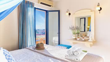 Suite Deluxe, vista para o mar | Minibar, cofre no quarto, secretária, quartos insonorizados