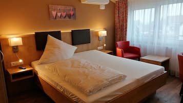 Minibar, secretária, quartos insonorizados, Wi-fi grátis