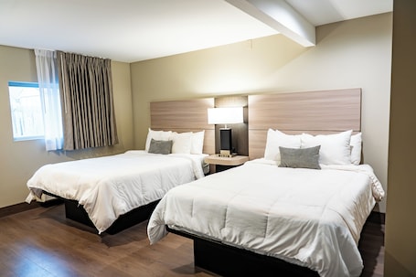 SuĆte, 1 quarto | Roupas de cama premium, camas com colchƵes pillow-top