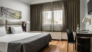 1 quarto, edredões de penas, minibar